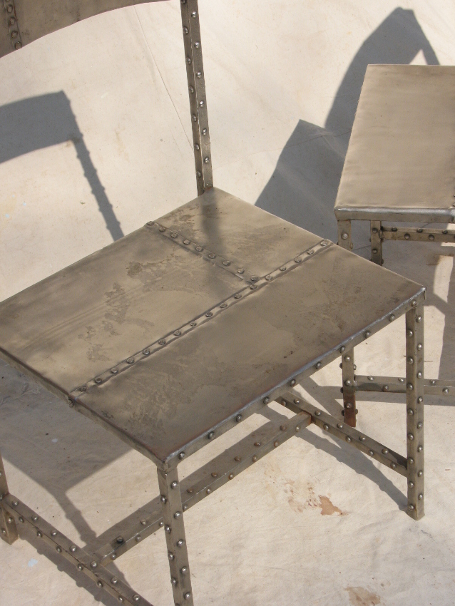 POLISHED STEEL RIVET CHAIRS